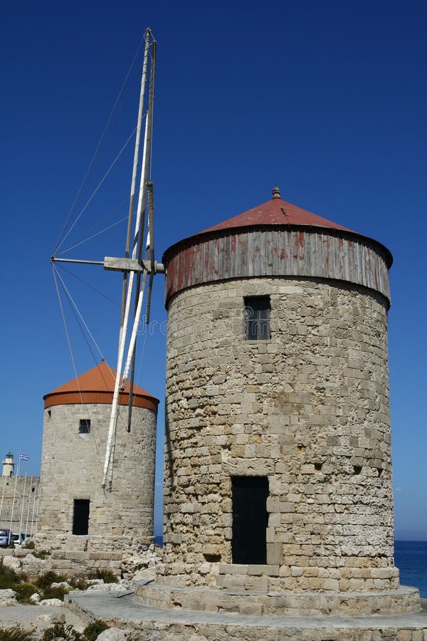 Windmill in Rhodes island stock photo. Image of aegean - 45517392