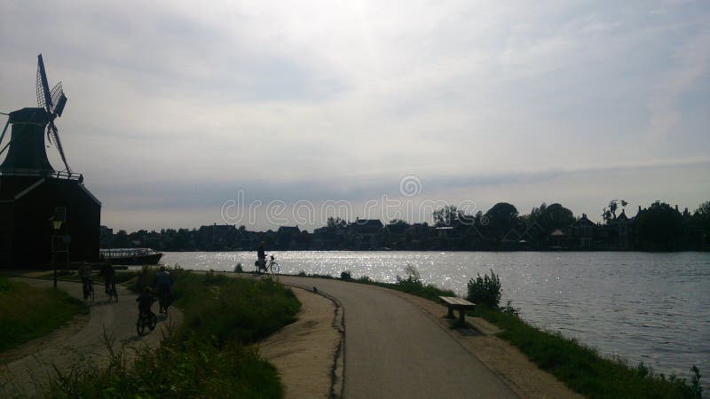 Windmill by the river stock image. Image of holland, paris - 43559005