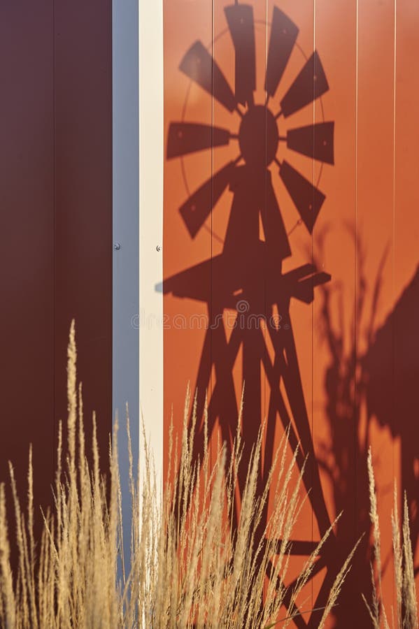Windmill shadow on barn stock image. Image of barn, vanes - 113686393