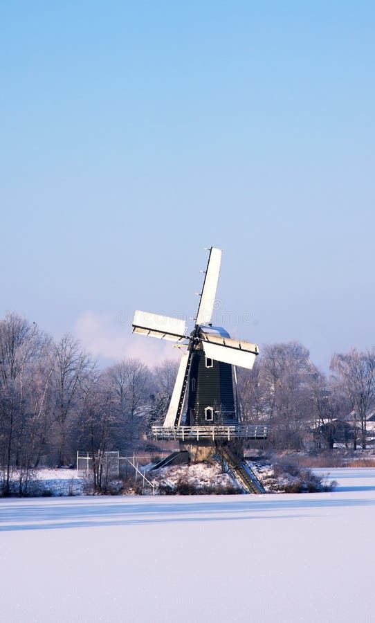 Windmill in the snow stock image. Image of snow, landscape - 23191361