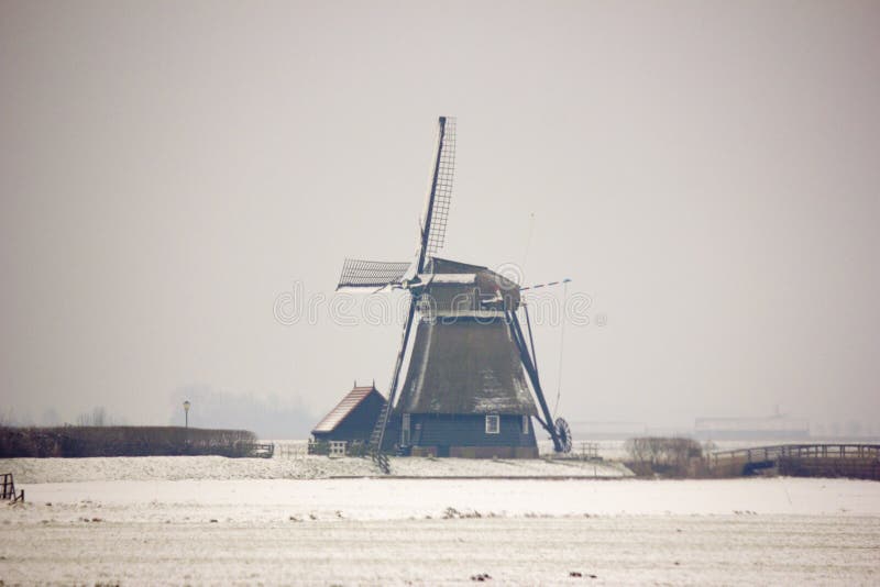 Windmill in the Snow stock photo. Image of farm, agriculture - 139962106