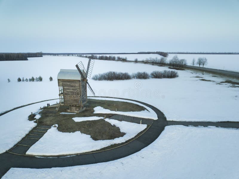 Windmill in the Snow stock photo. Image of farm, agriculture - 139962106