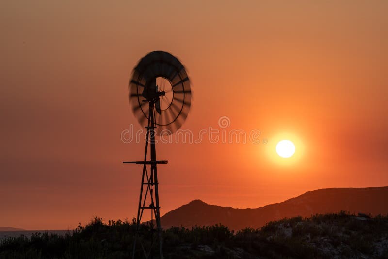 Orange Sunset with Clouds and Blue Sky Above Stock Photo - Image of ...