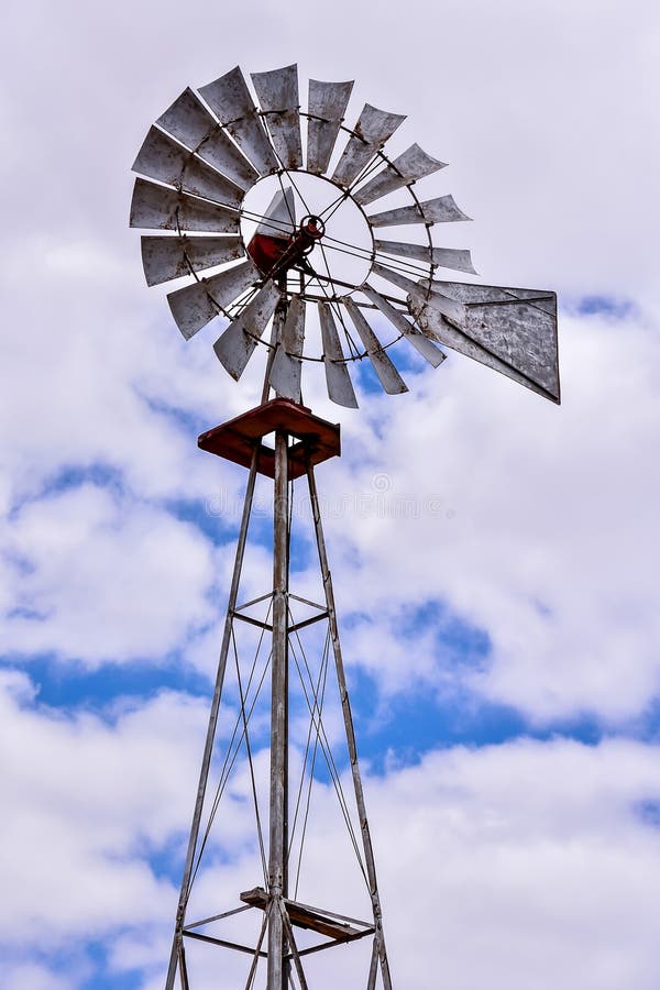 A Windmill is Standing Tall in the Sky Stock Photo - Image of power ...