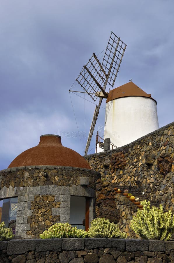 Windmill and stone wall stock image. Image of tourist - 12560209