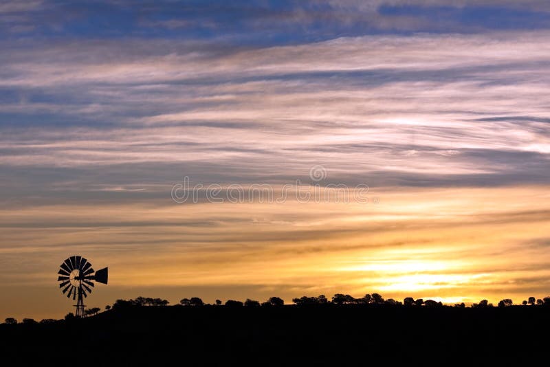Windmill at Sunrise stock image. Image of landscape, light - 11585273