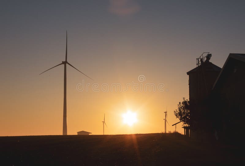 Windmill at sunrise stock image. Image of ecological - 137321305