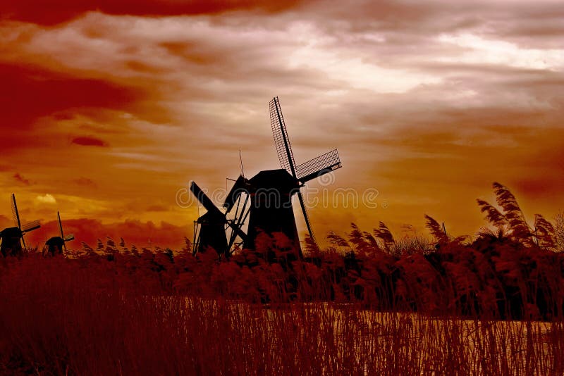 Windmill at sunset. stock photo. Image of reed, clouds - 29459400