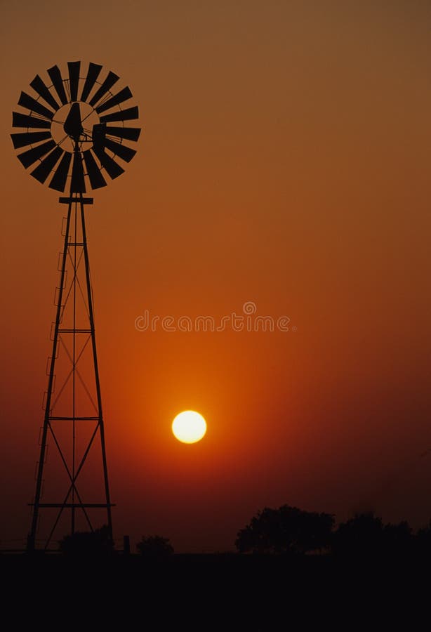 Windmill sunset. stock image. Image of tower, safari, orange - 5138373