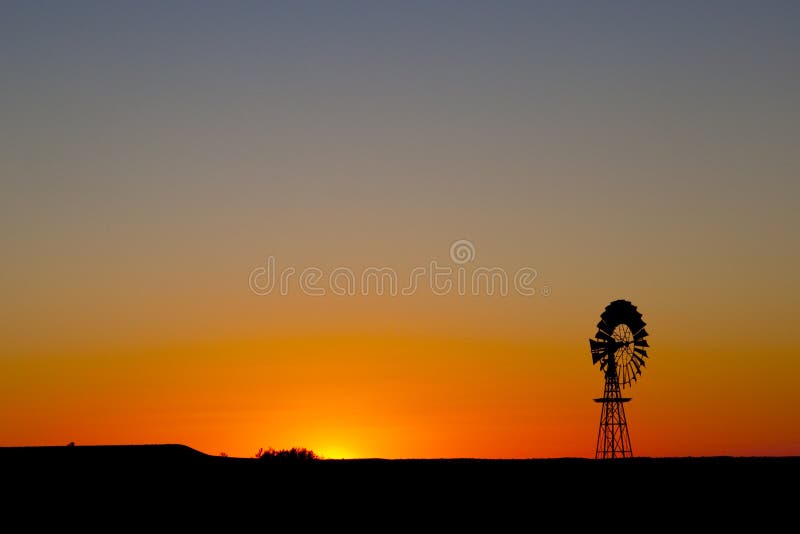 Windmill Sunset in Central Australia Stock Photo - Image of outback ...