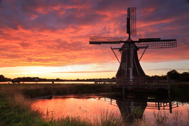 Windmill sunset stock image. Image of dutch, calm, beautiful - 57902779