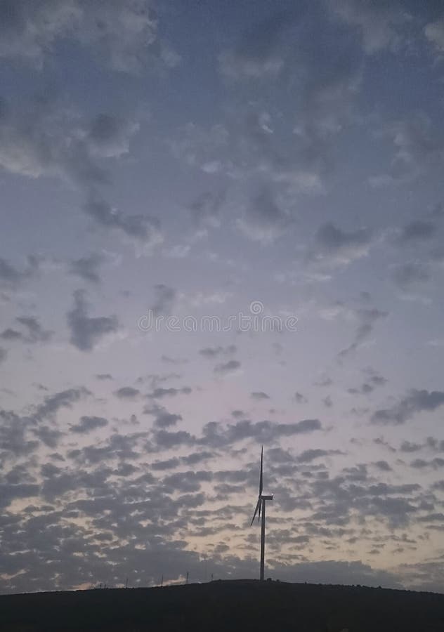 Windmill and sunset view stock photo. Image of evening - 88057484