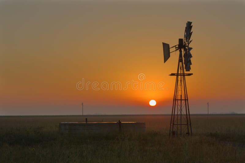 Windmill at sunset stock photo. Image of africa, sunset - 103876188