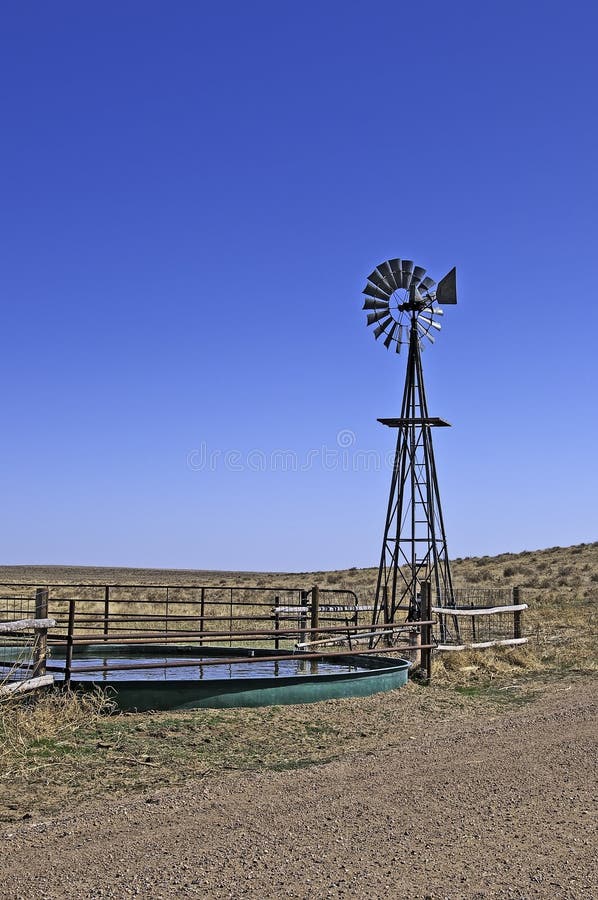 Windmill and Tank in Northern Colorado, USA Stock Photo - Image of ...