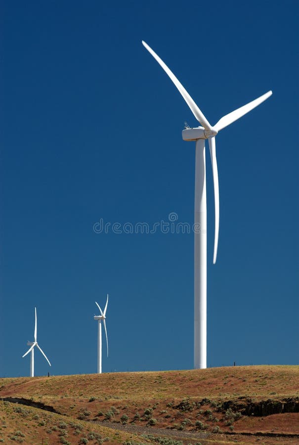 Windmill Trio stock photo. Image of electricity, pylons - 14823054