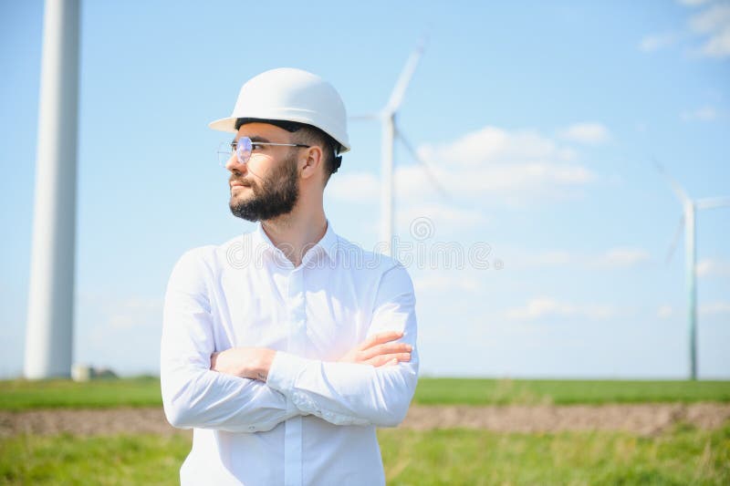 Windmill Turbine Maintenance Engineer Standing at Wind Farm. Stock ...
