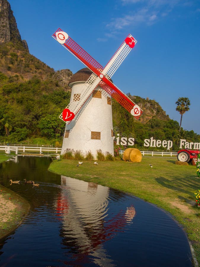 Windmill and Water Canal Reflection in Farm Stock Photo - Image of ...