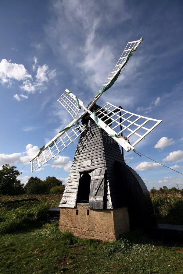 Windmill at Wicken Fen stock image. Image of reeds, clouds - 10945427