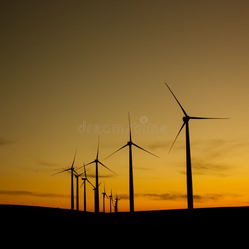 Wind Turbines stock image. Image of wind, purple, sunset - 2401021