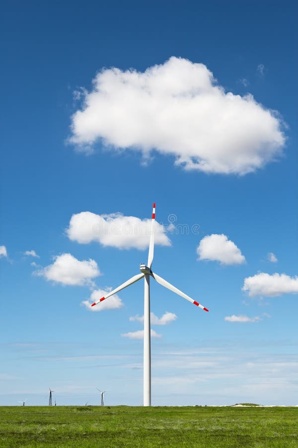 Windmills in a field stock photo. Image of energies, conservation ...