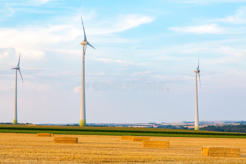 Windmills on the field stock image. Image of electricity - 60557869