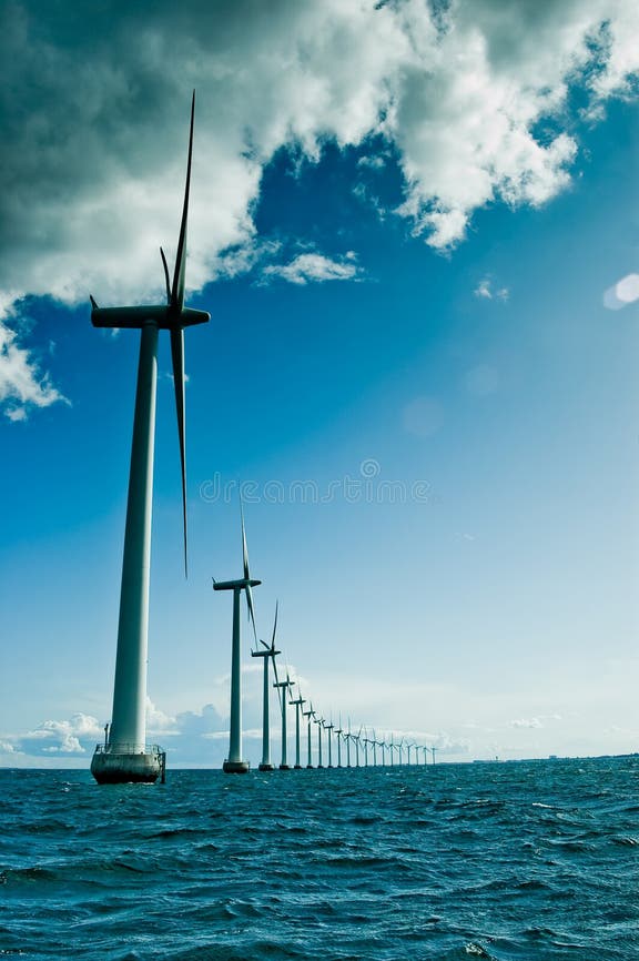 Windmills in a Row Vertical Stock Photo - Image of clean, europe: 13165434