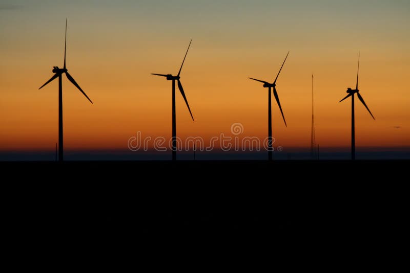 Wind Turbines stock image. Image of wind, purple, sunset - 2401021