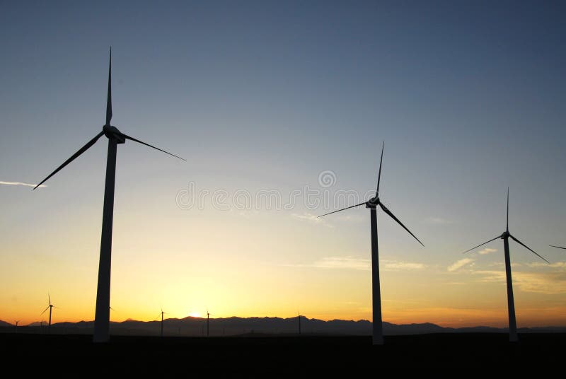 Wind Turbines stock image. Image of wind, purple, sunset - 2401021