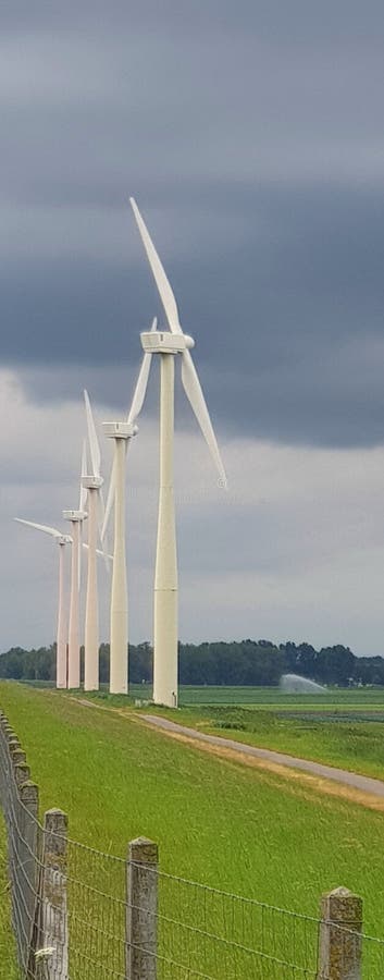 Windmills wind energy stock photo. Image of colored - 121284444