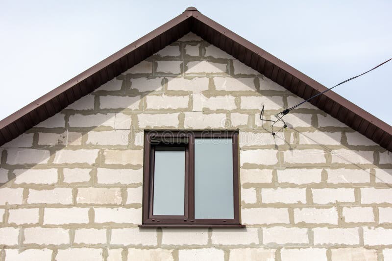 Window in the Attic of a Brick House Stock Image - Image of home ...