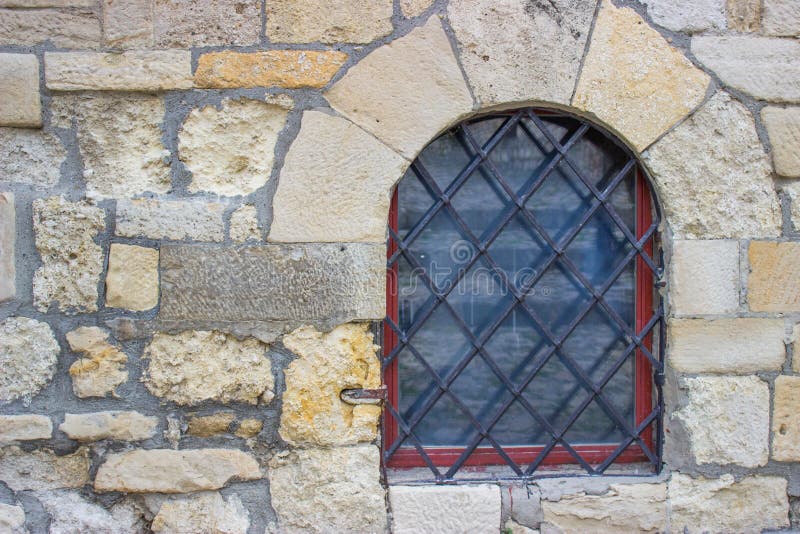 Window with Bars in the Stone Wall Stock Photo - Image of fort, dark ...