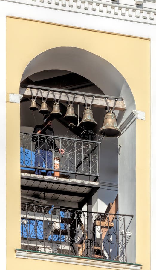 A Window of the Belfry on the Church. the Bell-ringer Rings the Church ...