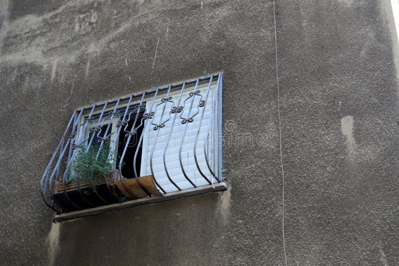 Window in a Big City in Israel Stock Image - Image of wall, shutters ...