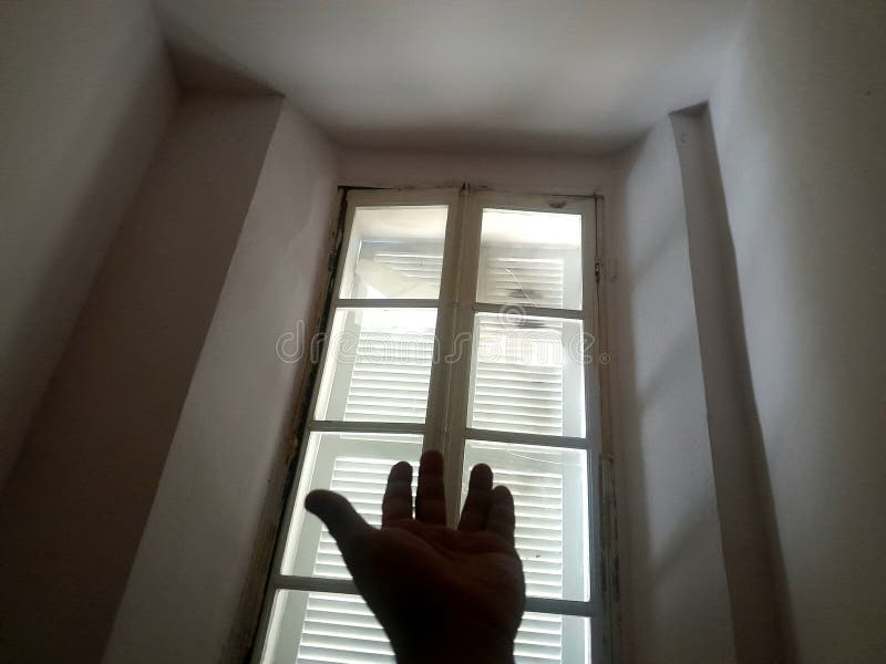 Window Bright Light Feel by Hand from Room. Hand Silhouette in Front of ...