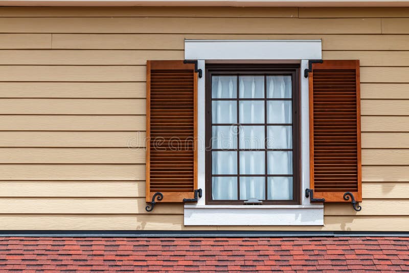 Window with brown shutters stock image. Image of pattern - 77781481