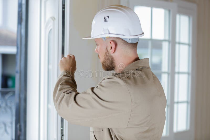 Window Builder Working on Mount New Installation Stock Image - Image of ...