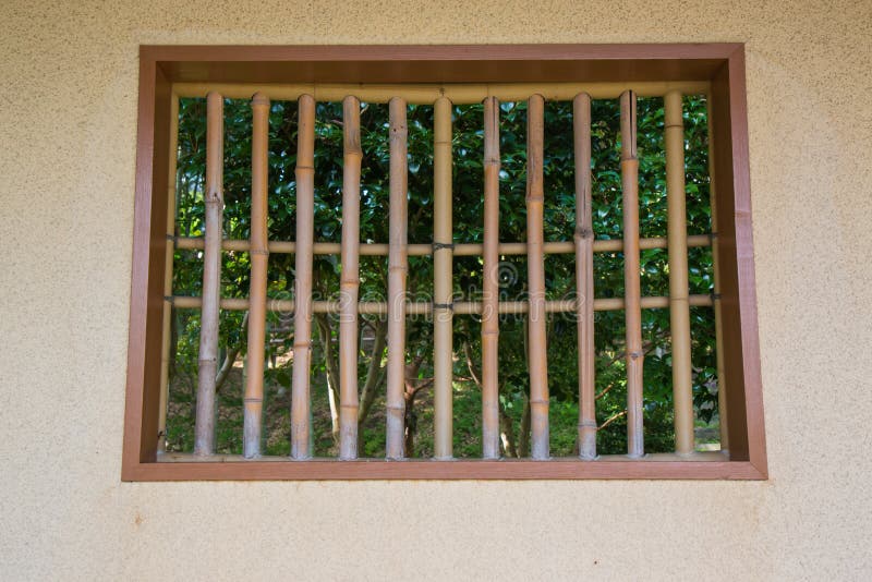 Window cage with wood bars stock photo. Image of house - 58467386