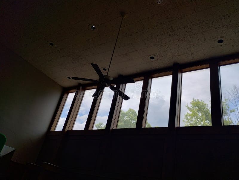 Window with Ceiling Fan Tall Angle Blue Sky Trees Stock Image - Image ...