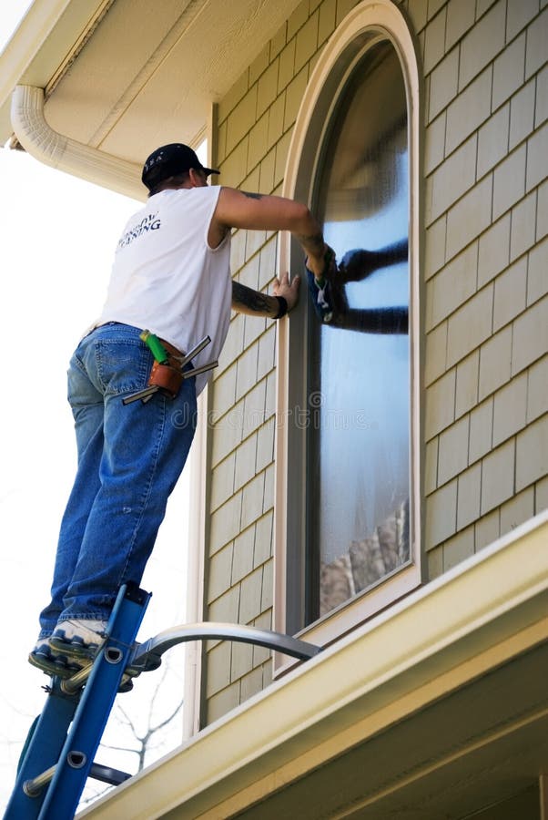 Man on a Ladder stock photo. Image of windows, fall, unsafe - 2831178