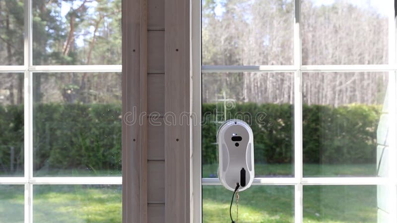 Window Cleaning Robot. Washing Glass Using Technology in a Modern Home ...