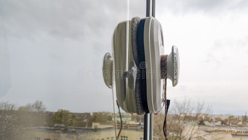 Window Cleaning Tool with Suction Cups Attached To Glass, Showcasing ...