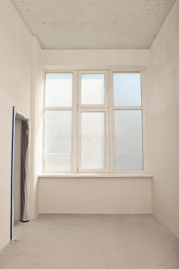 Window Covered with Polyethylene Film. Protection during Repair Stock ...