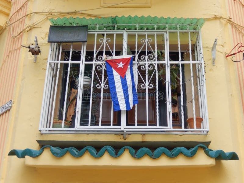 WINDOW with CUBAN FLAG, HAVANA, CUBA Stock Photo - Image of yellow ...