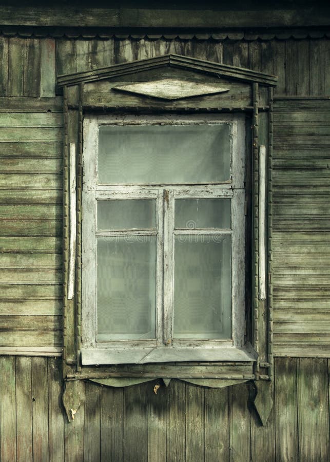 The Window on the Facade of an Old Wooden House. Stock Photo - Image of ...