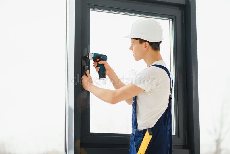 Window Fitter Using Cordless Drill Stock Photo - Image of plastic ...