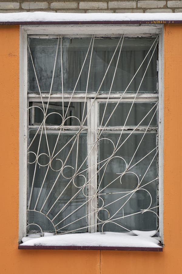 Window Grille On A Window Of Old Soviet Brick House Stock Image - Image ...