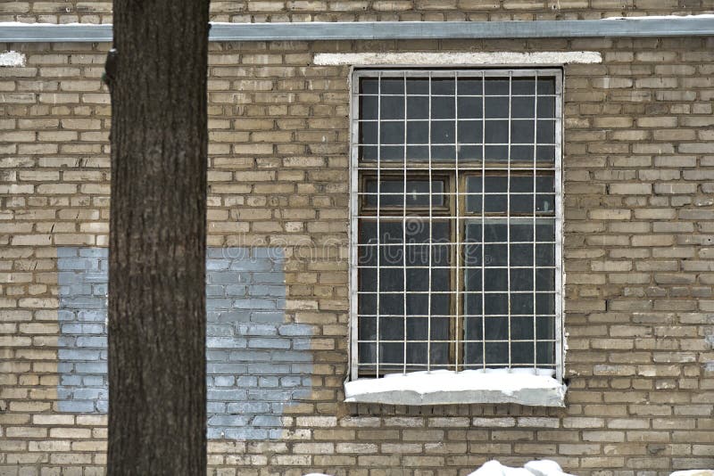 Window Grille on a Window of Old Soviet Brick House Stock Image - Image ...