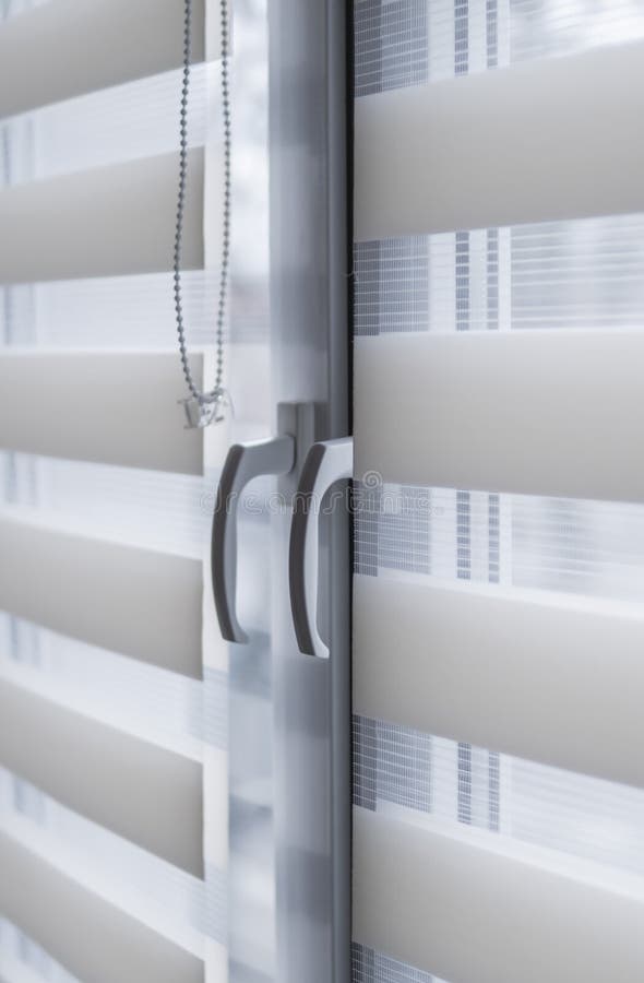 Window Handle and White Fabric Roller Blinds on the White Plastic ...