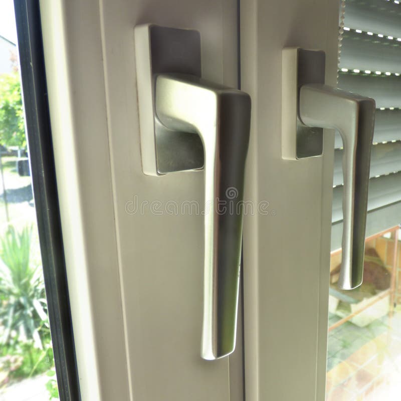 Window Handles On Plastic Window Stock Photo - Image of profile, bronze ...