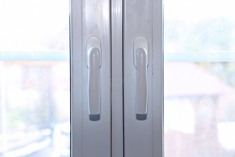 Window handles on windows stock photo. Image of closed - 57106322